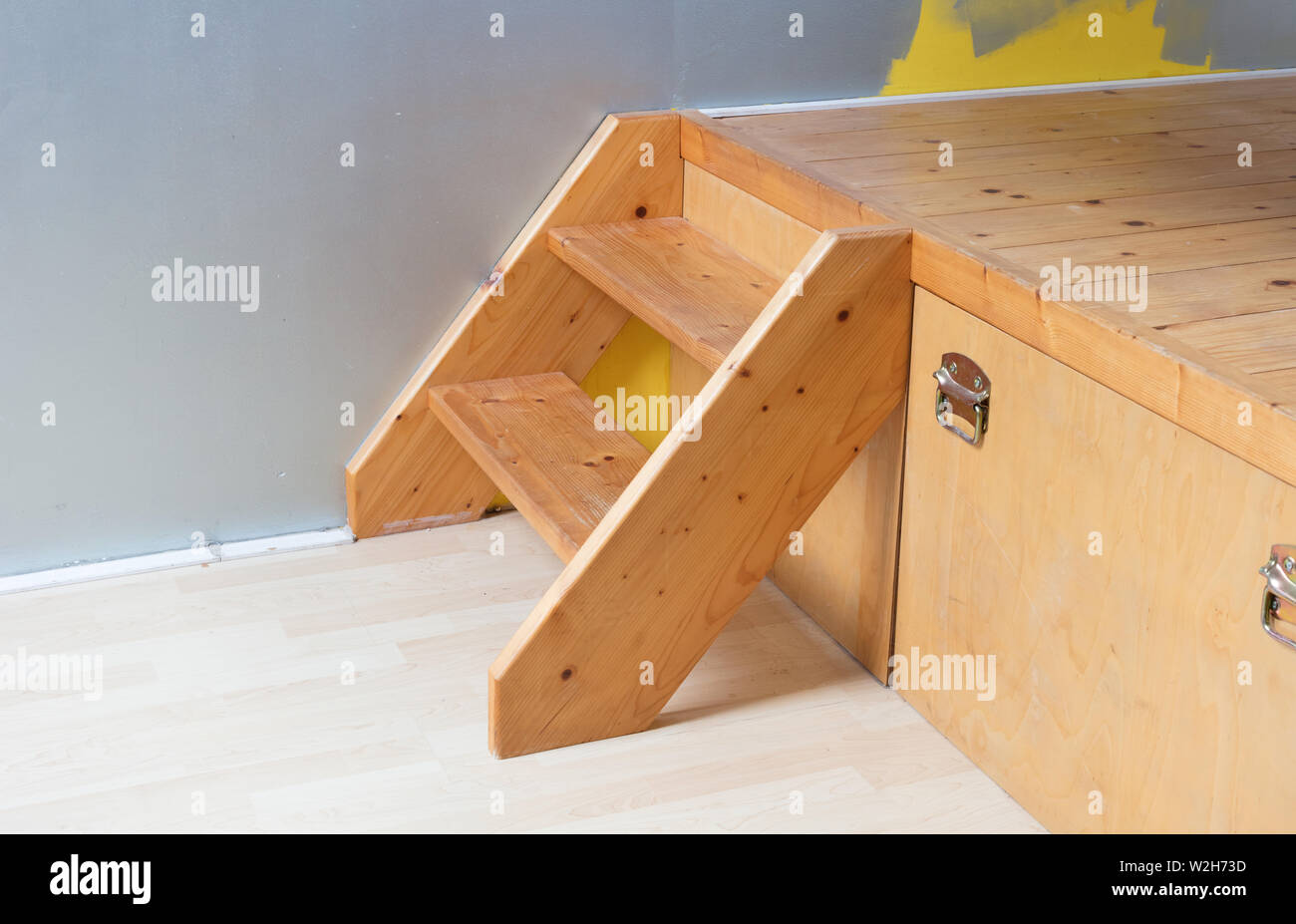 Small wooden stairs, leading up to a stage Stock Photo - Alamy
