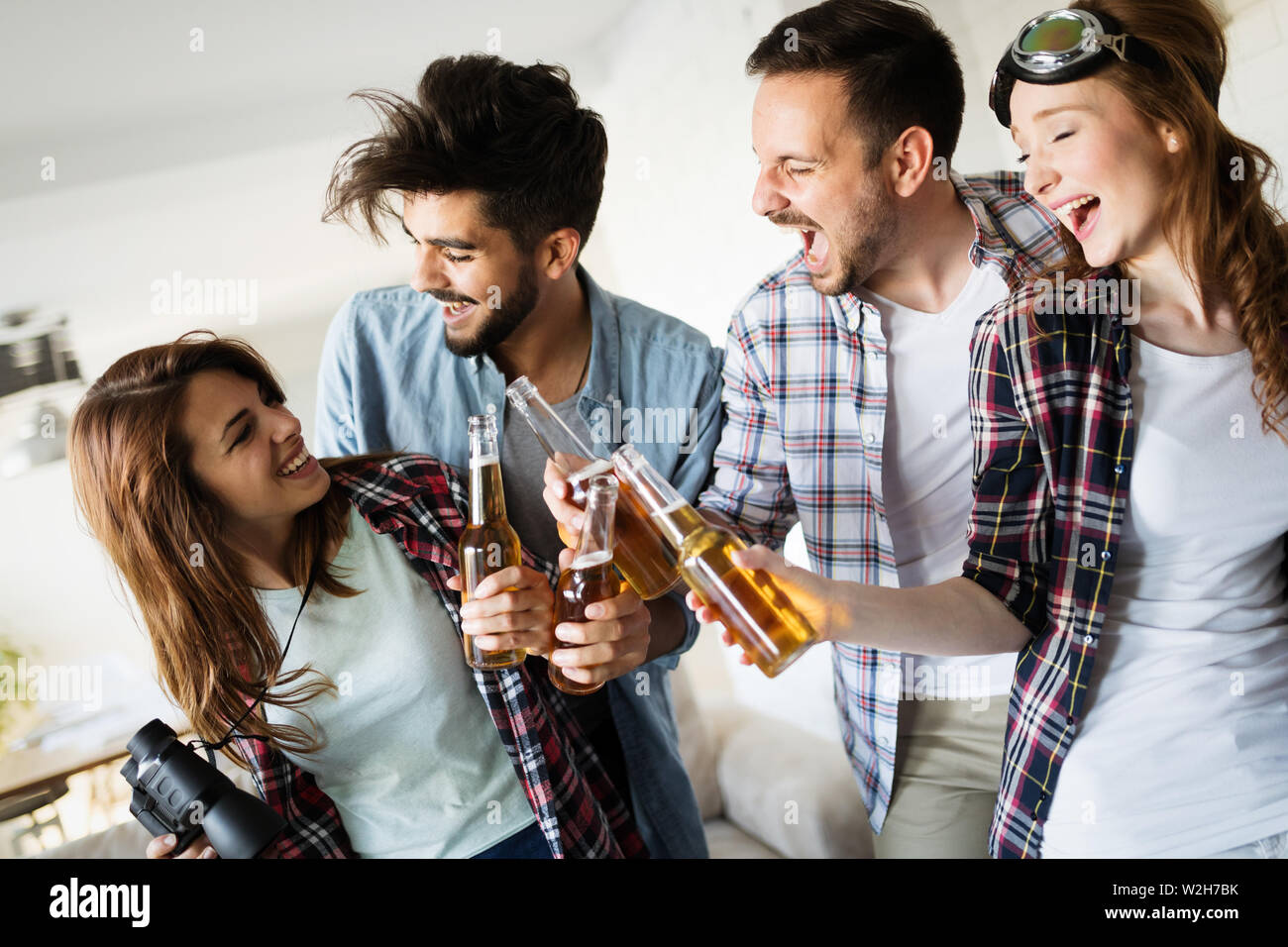 Happy cheerful friends spending fun times together Stock Photo - Alamy