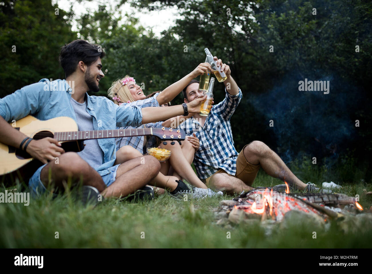 Sitting by camp fire hi-res stock photography and images - Alamy