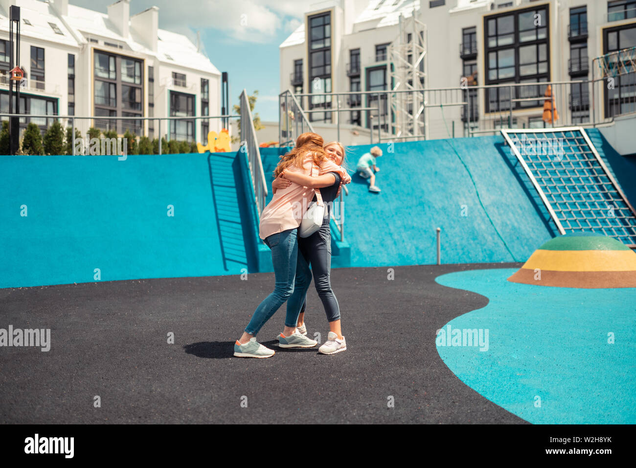 Beautiful girl hugging tight hi-res stock photography and images - Alamy