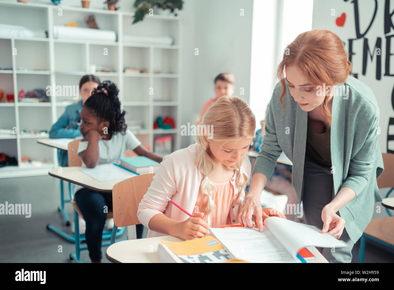Attentive teacher hi-res stock photography and images - Alamy