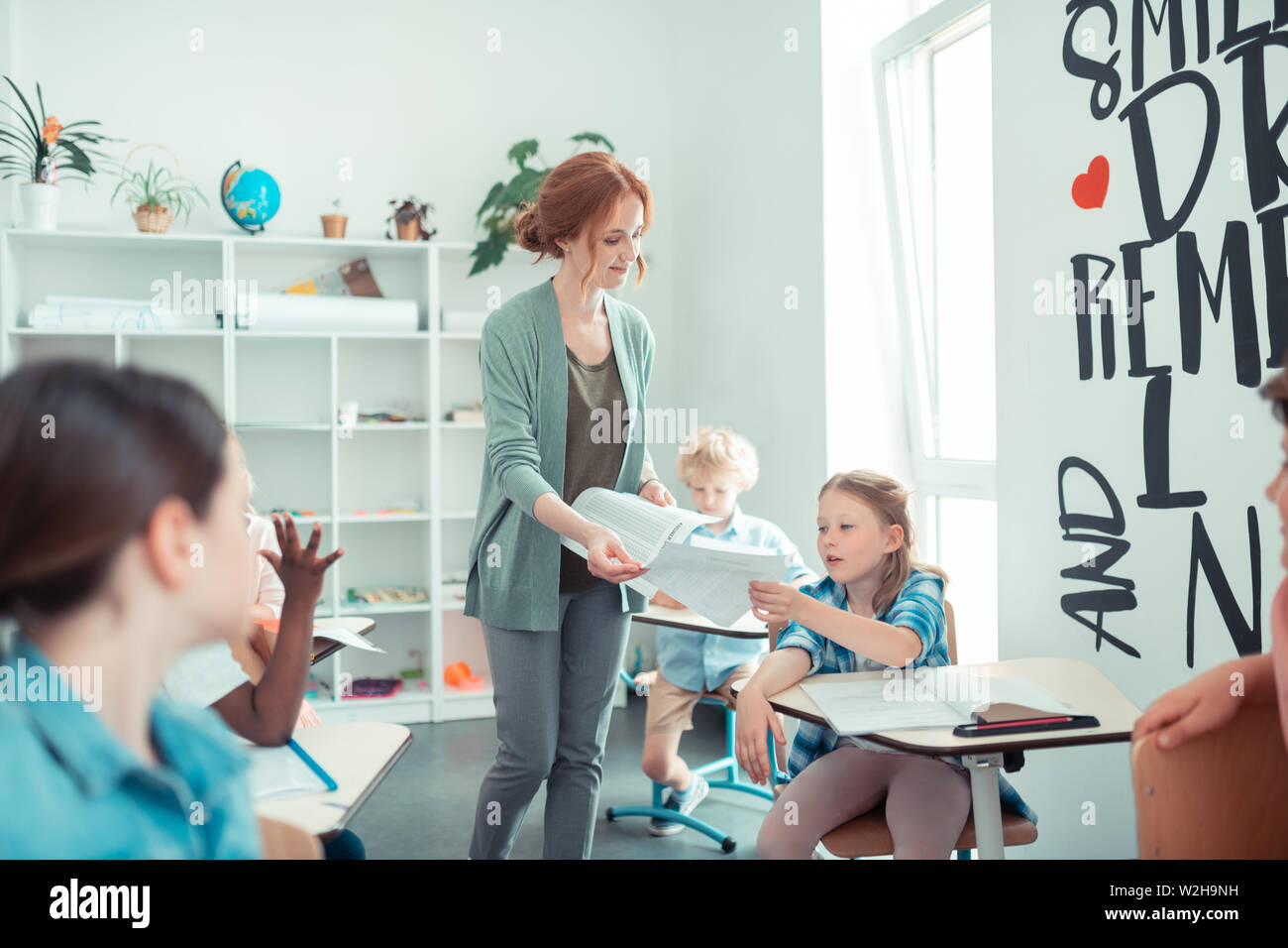 Taking sheet paper classroom hi-res stock photography and images - Alamy