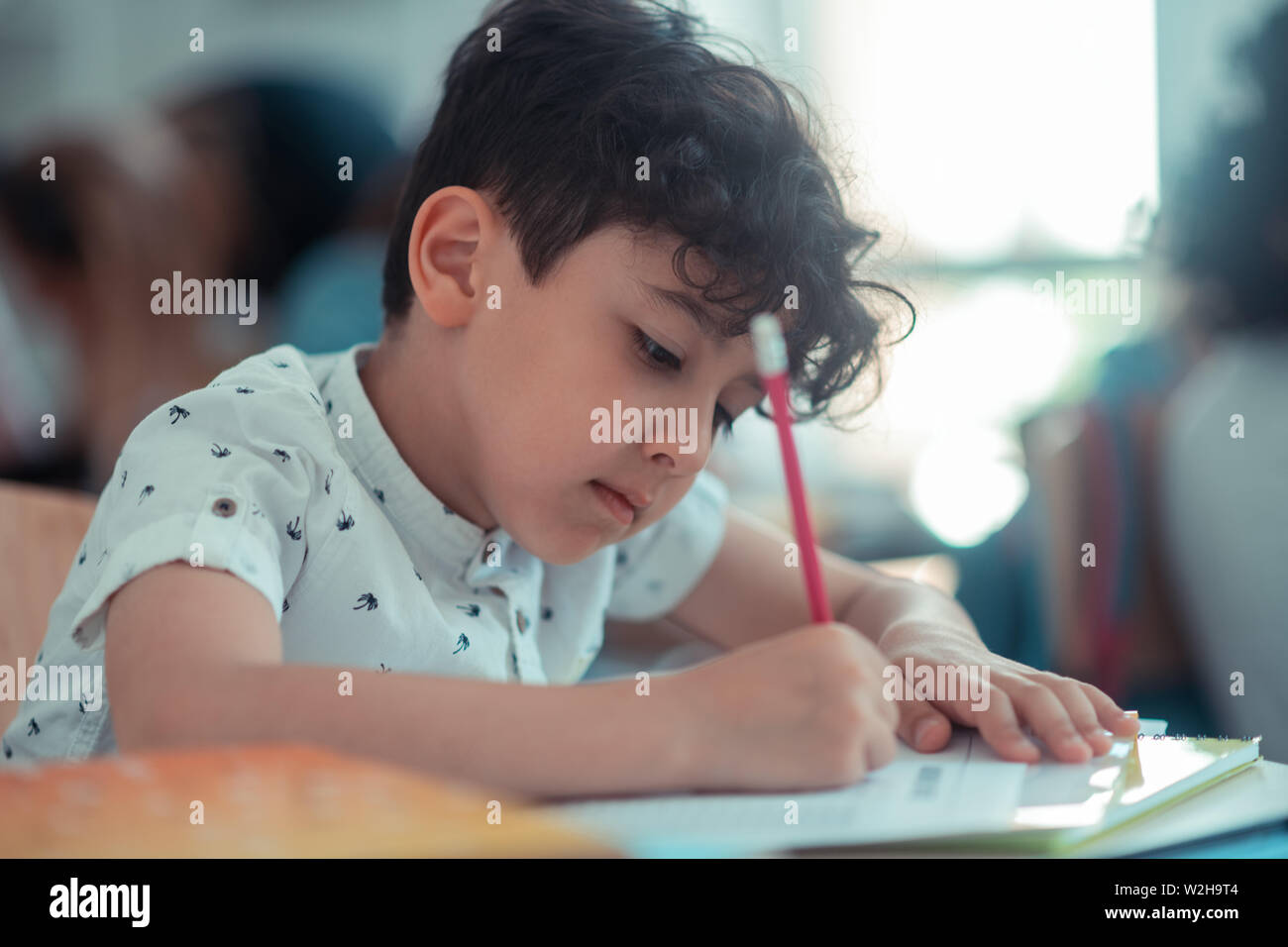 Kids writing test hi-res stock photography and images - Alamy