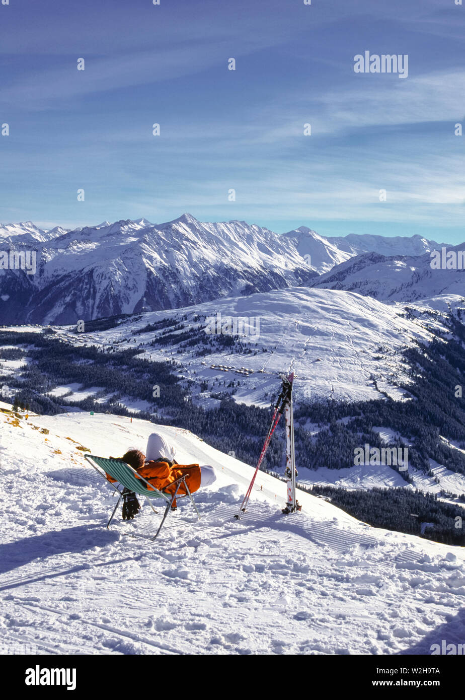 Skier Resting at Ski Station Stock Photo - Alamy