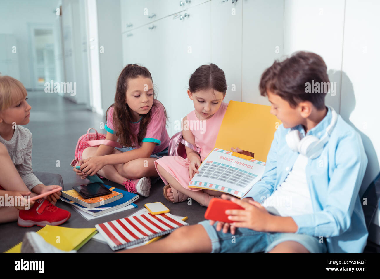 Children discussing their school schedule during break Stock Photo - Alamy