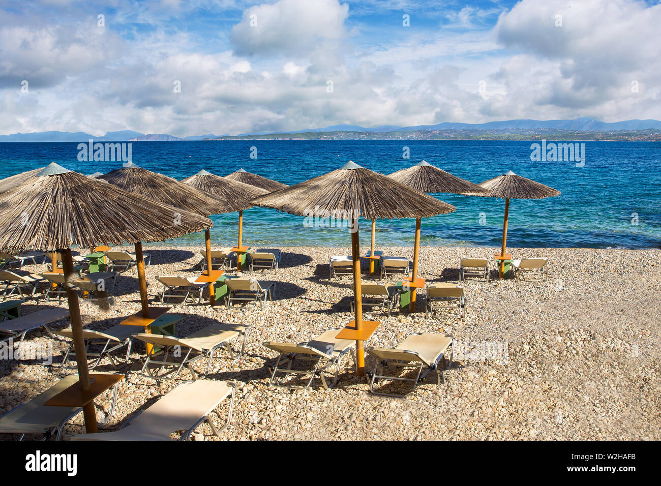 Awe beach on greek island . Awning with thatched roof. , fresh air and ...