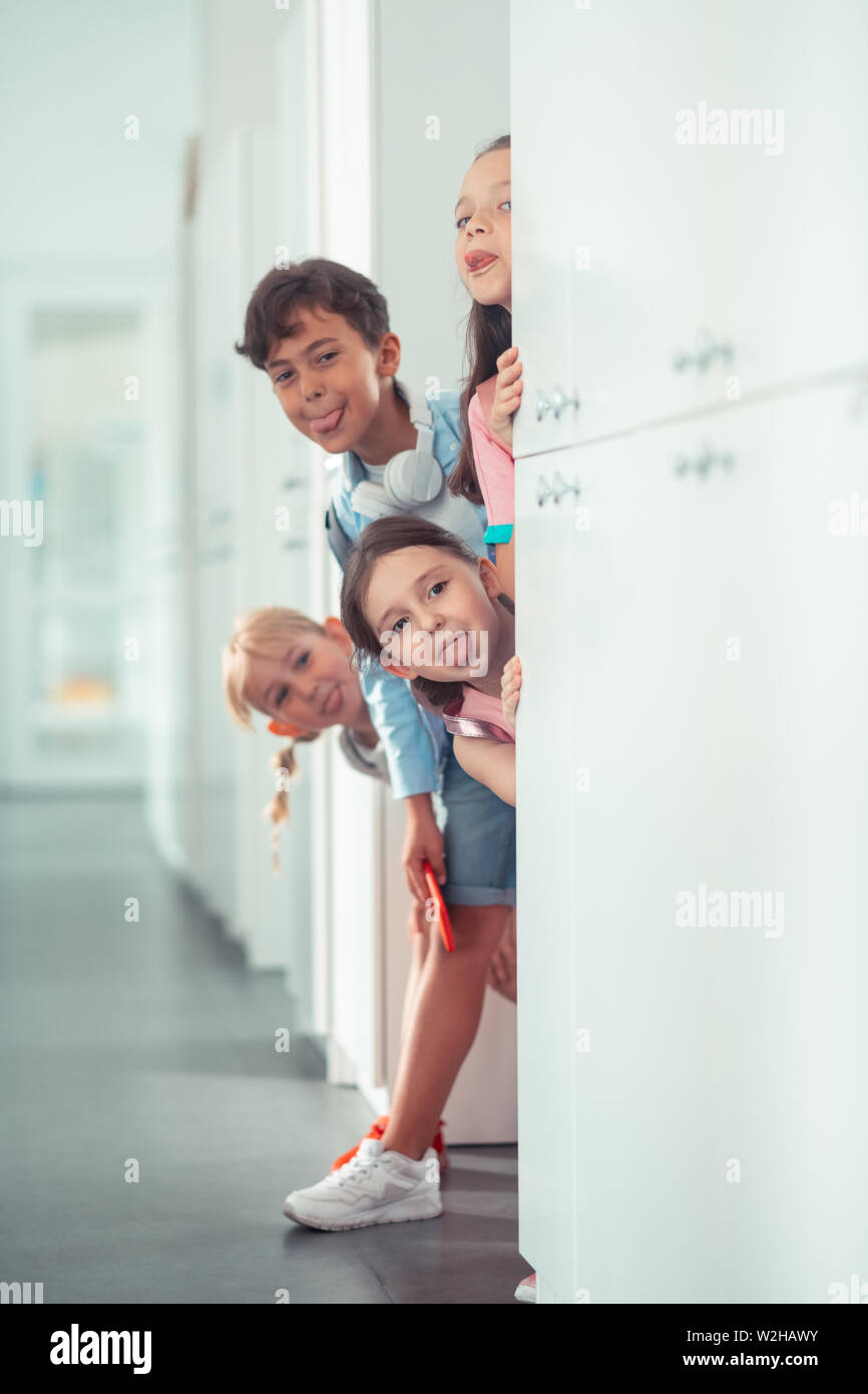 Funny children having much fun during school break Stock Photo - Alamy