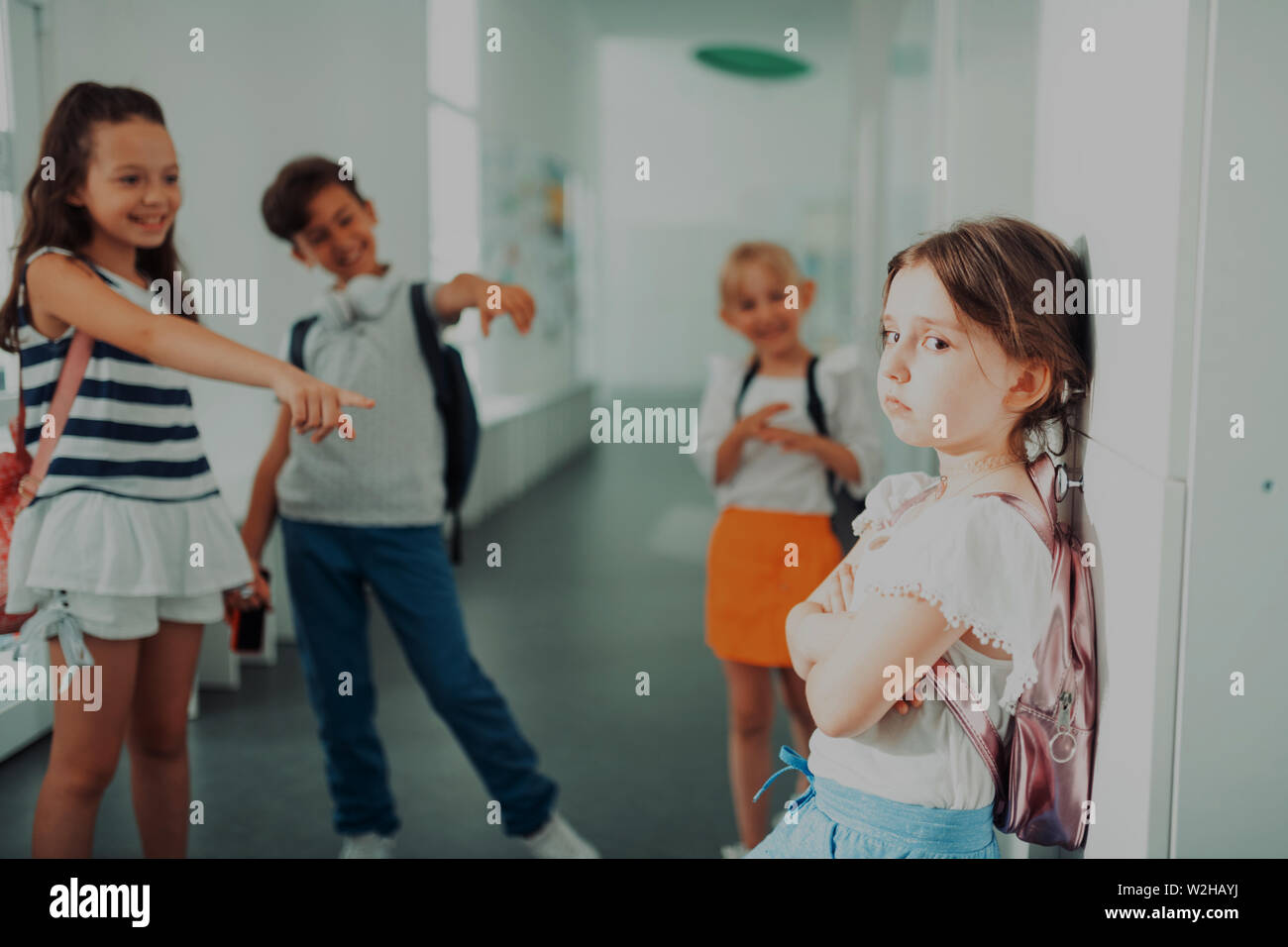 Little girl feeling lonely and stressed suffering from mockery Stock ...