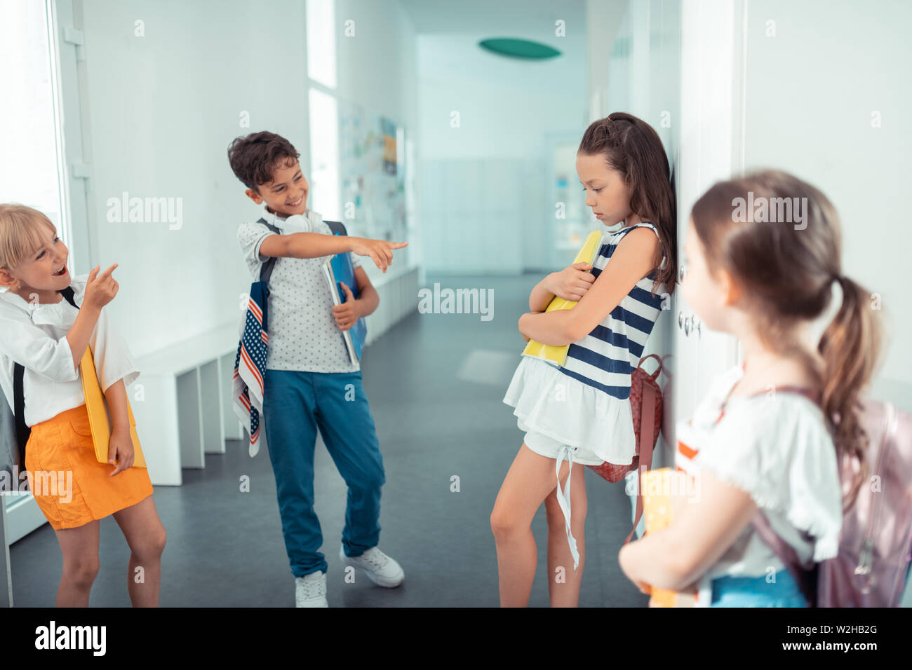School girls bullying girl hi-res stock photography and images - Alamy