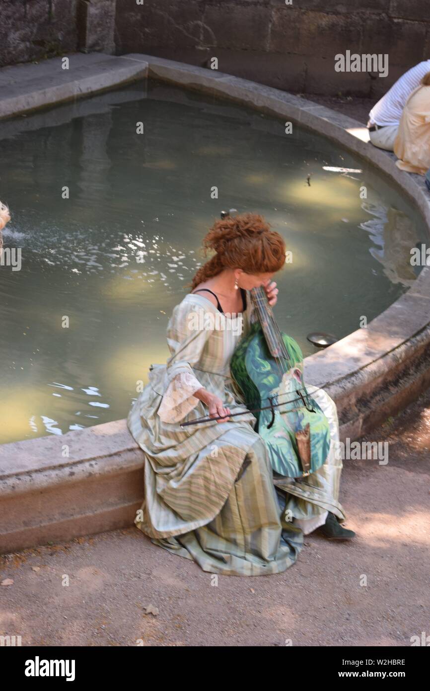 Rococo Lady playing Cello Stock Photo - Alamy