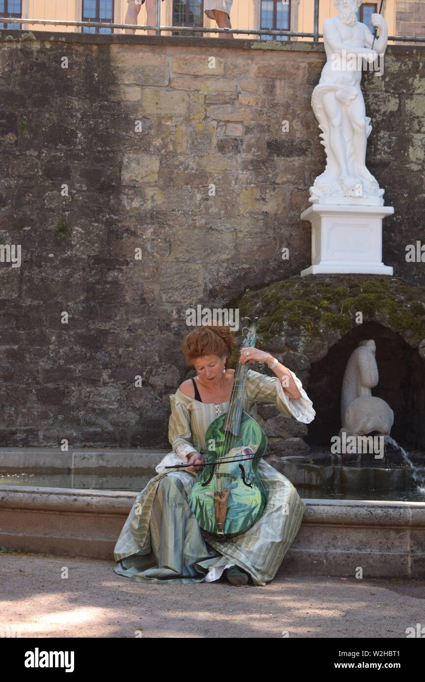 Rococo Lady playing Cello Stock Photo - Alamy