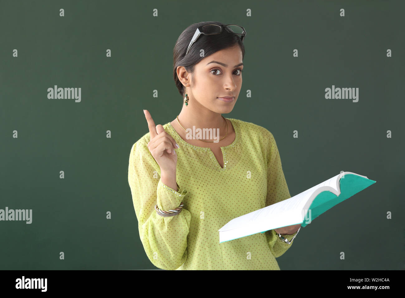 Teacher teaching in a classroom Stock Photo - Alamy