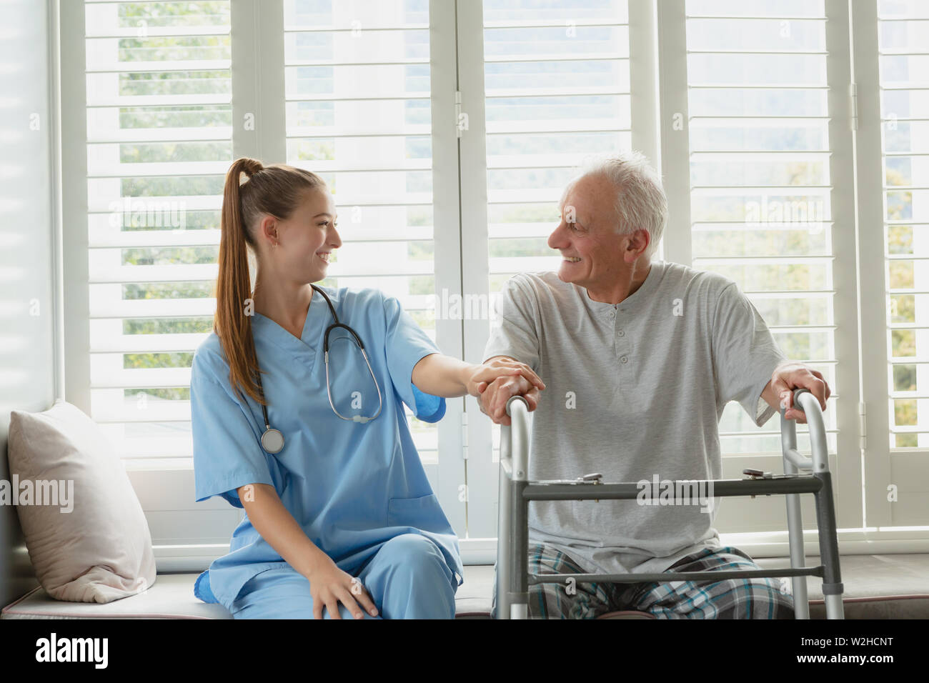 Doctor consoling women hi-res stock photography and images - Alamy