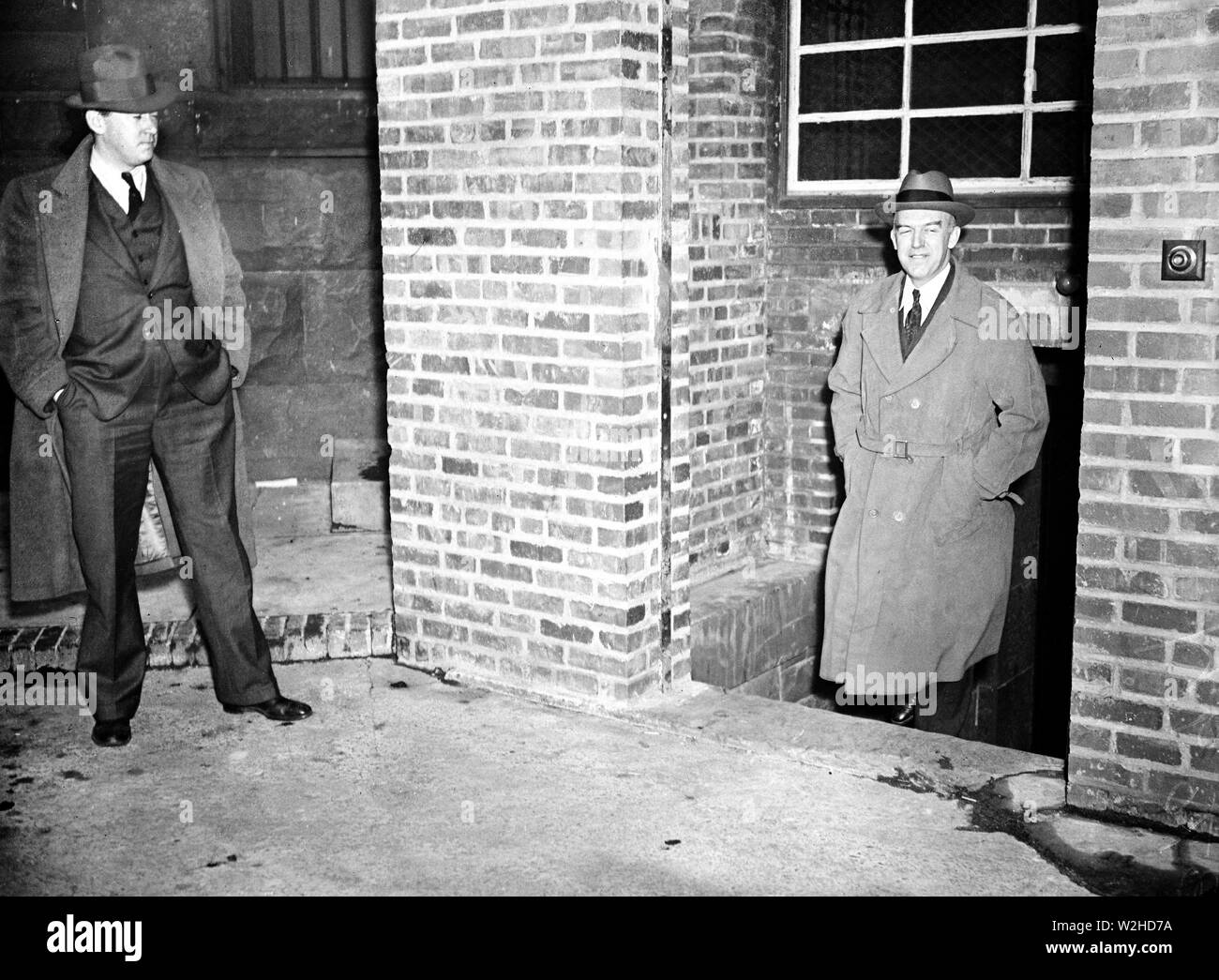 Two men wearing trench coats hi-res stock photography and images - Alamy