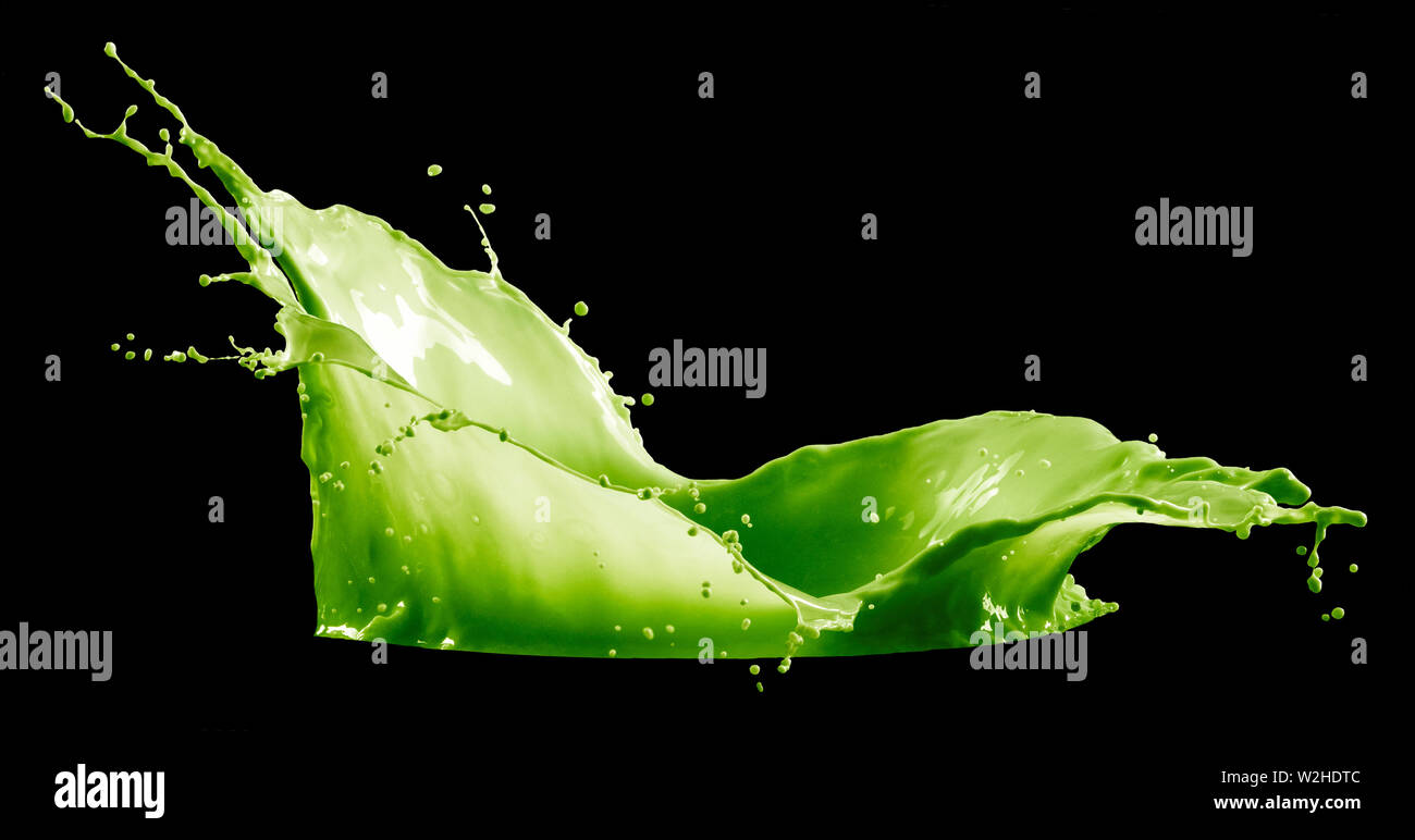 green paint splash isolated on black background Stock Photo - Alamy