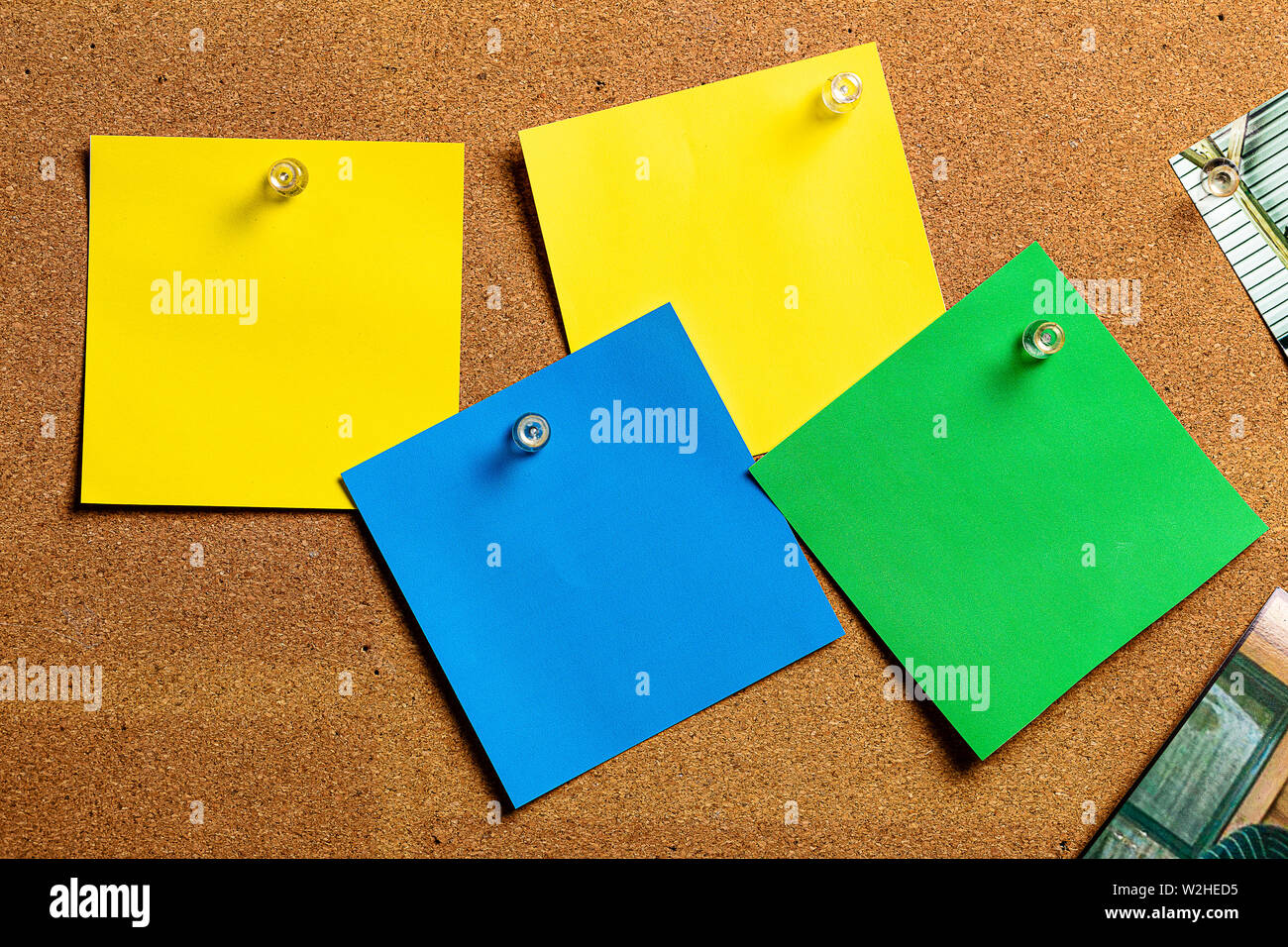 Corkboard/Bulletin Board and blank Sticky Notes in Yellow, Green and ...