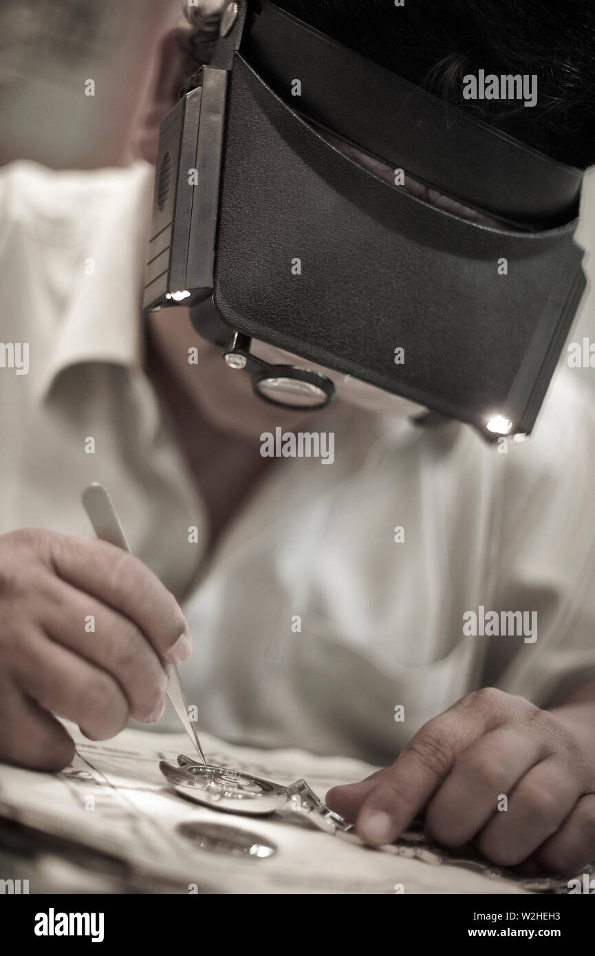 Man repairing watches hi-res stock photography and images - Alamy