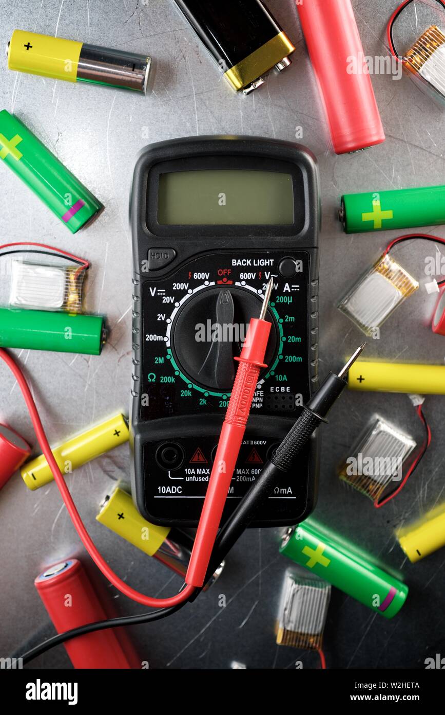 Electric measuring device and rechargeable batteries Stock Photo - Alamy