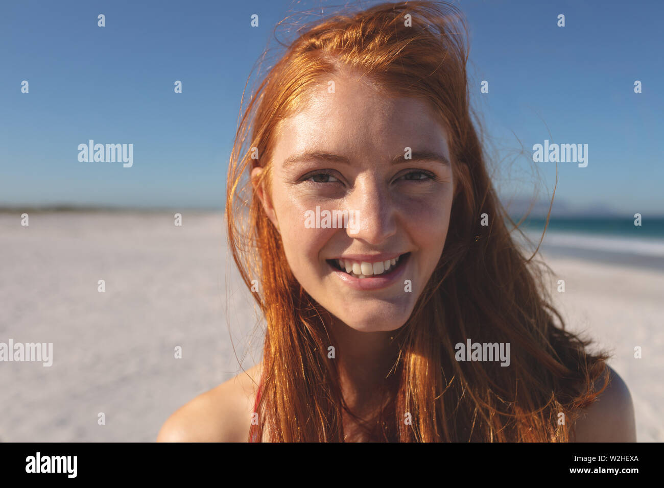 Female redhead beach hi-res stock photography and images - Alamy