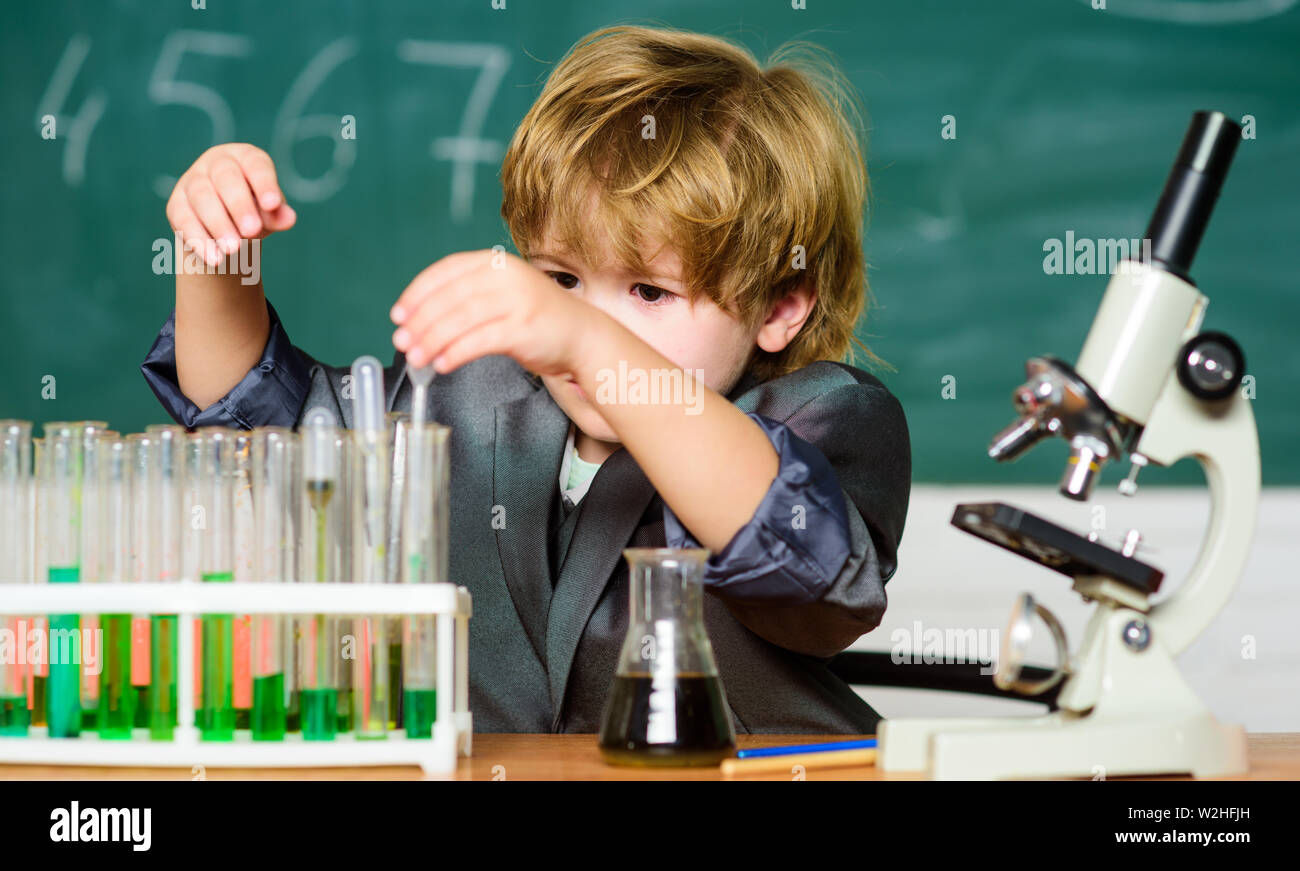 Gifted child and wunderkind. Kid study chemistry school. School ...