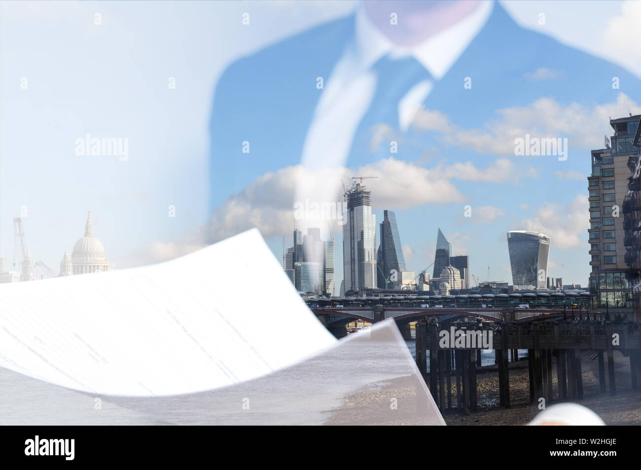 Business Deal, man in business suit holding a contract in front of ...