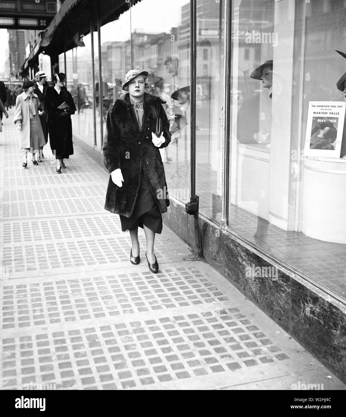 Woman walking about in the city Black and White Stock Photos & Images ...