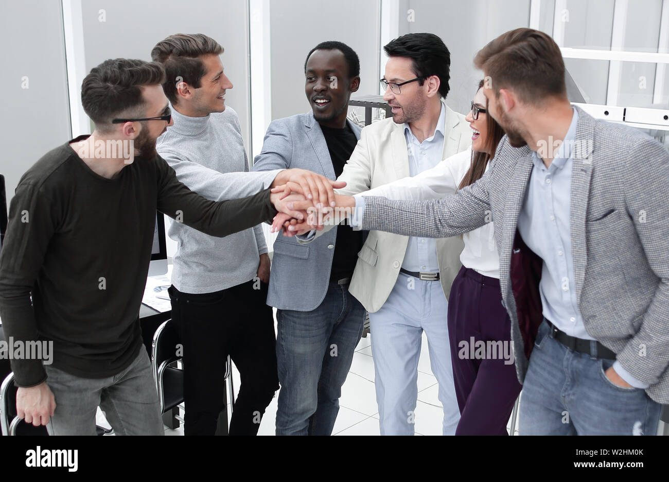 successful business team showing their unity Stock Photo - Alamy