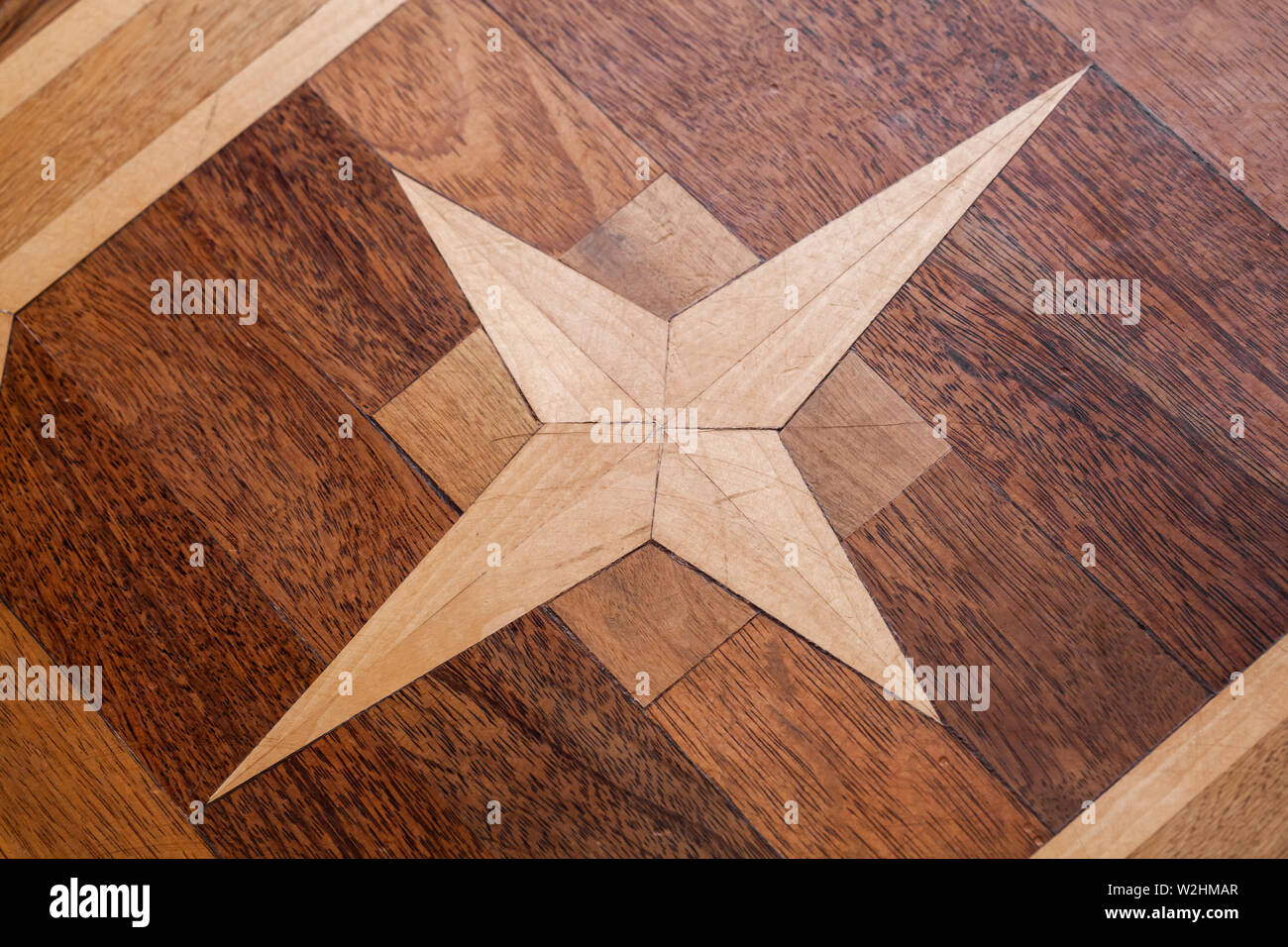 Vintage parquet with geometric star pattern. Background photo texture ...