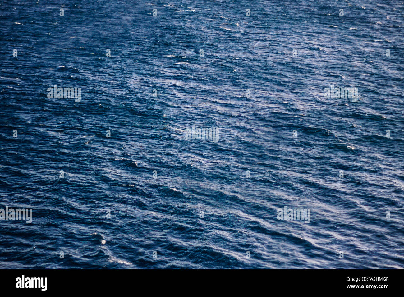 Blue water view from above. Deep blue color. Blue background. Sea and ...