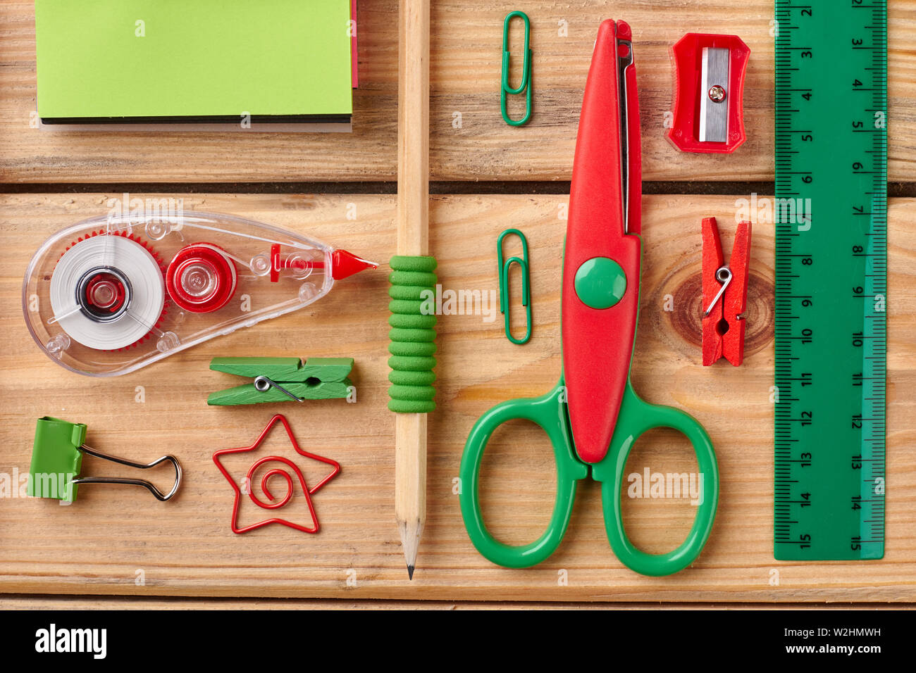 Colorful school items on wooden boards Stock Photo - Alamy