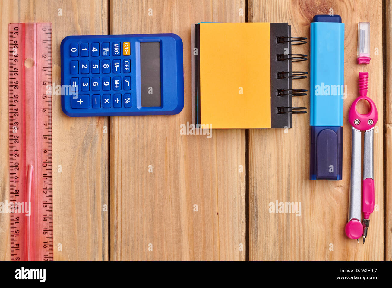 School supplies on desk background with copy space Stock Photo - Alamy