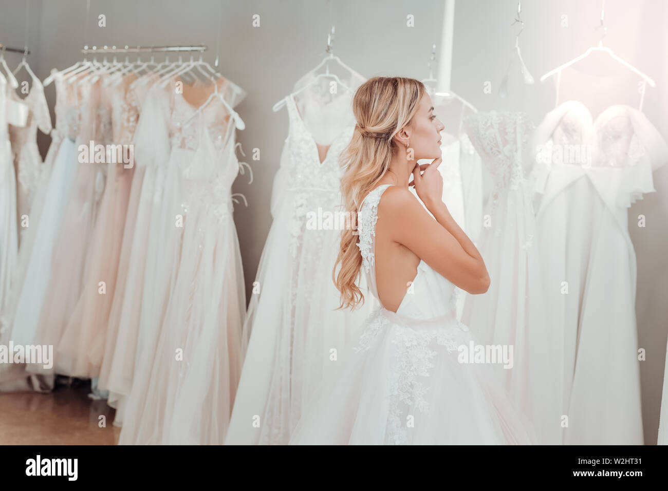 Young bride thinking about her wedding look Stock Photo - Alamy