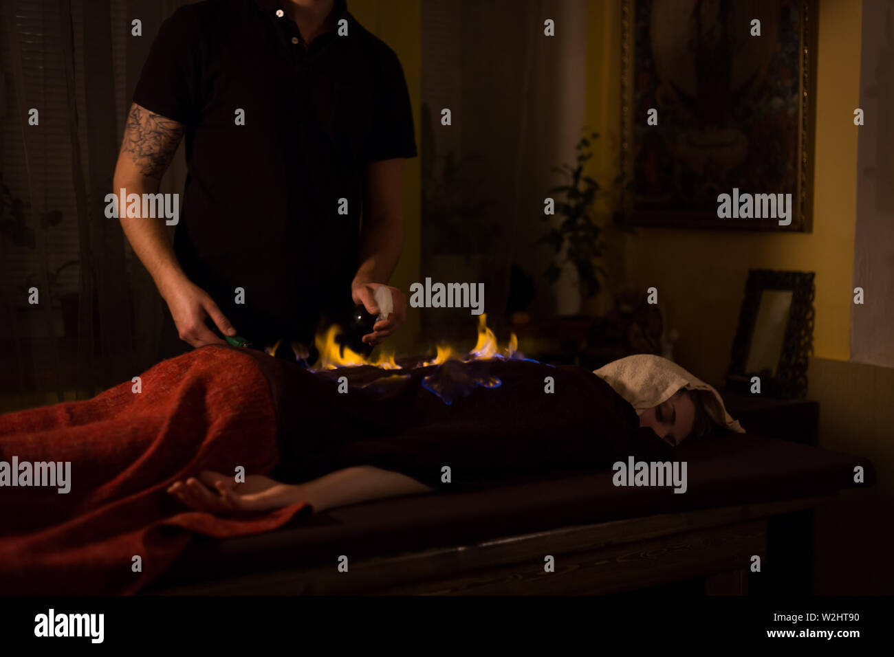 Chinese fire massage and therapy Stock Photo - Alamy