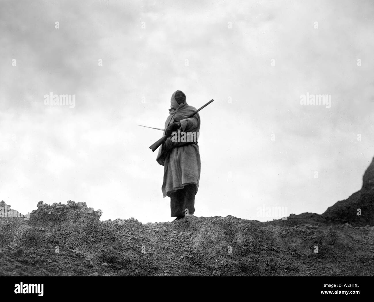 Indian holding rifle hi-res stock photography and images - Alamy