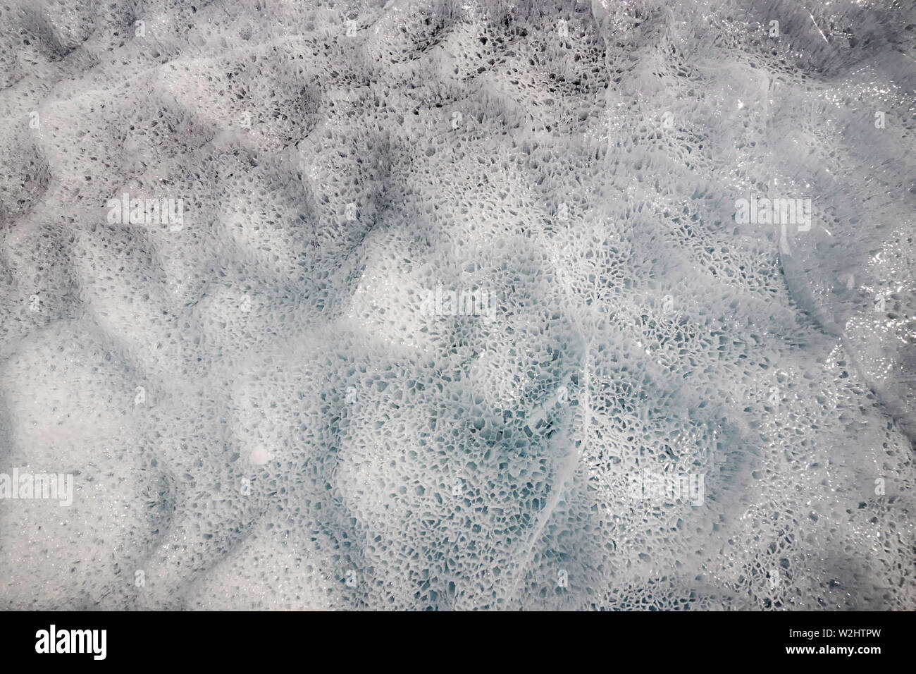 Winter lake ice bubbles on a Colorado frozen alpine lake Stock Photo ...