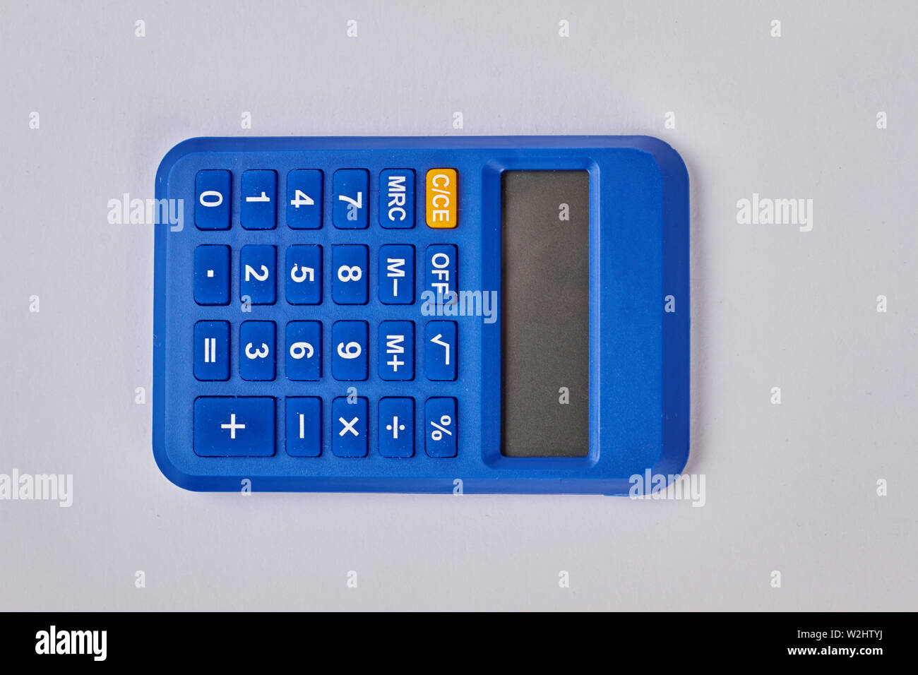 Blue digital calculator on white background Stock Photo - Alamy