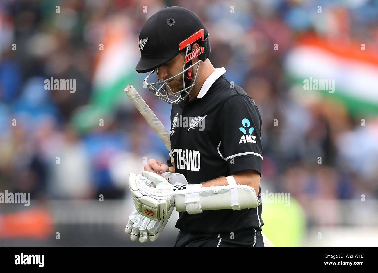 New Zealand's Kane Williamson appears dejected after being caught out ...