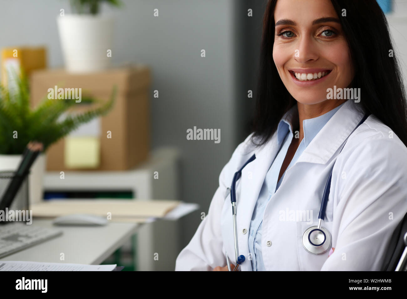 Indian female doctor portrait aganist hospital Stock Photo - Alamy