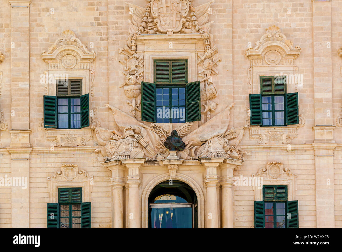 Malta architecture. Sculptures on the facades of buildings and the ...