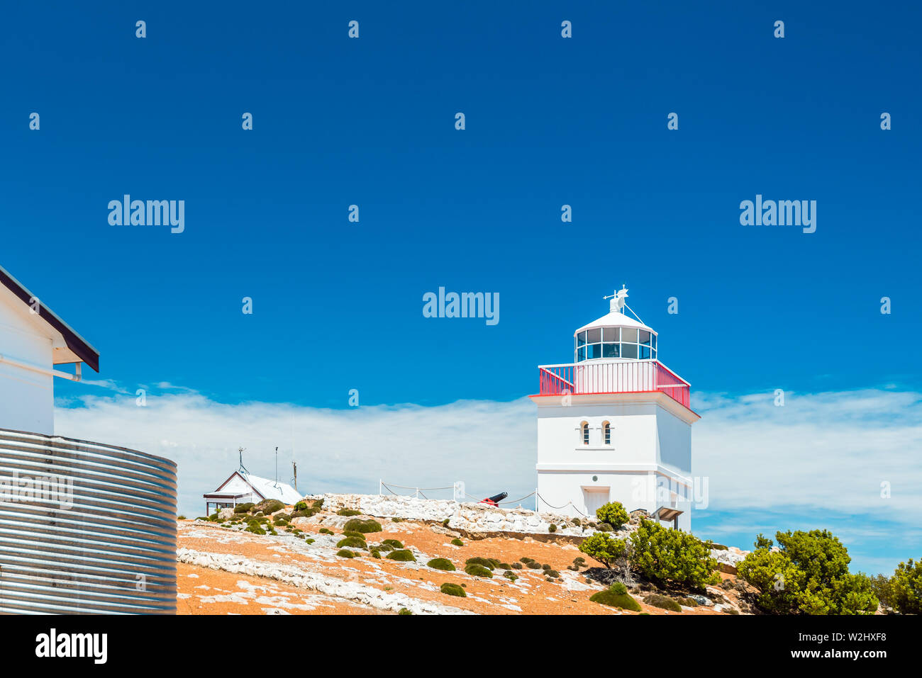 Unique square shape Cape Borda Lighthouse with cannon on a bright day ...