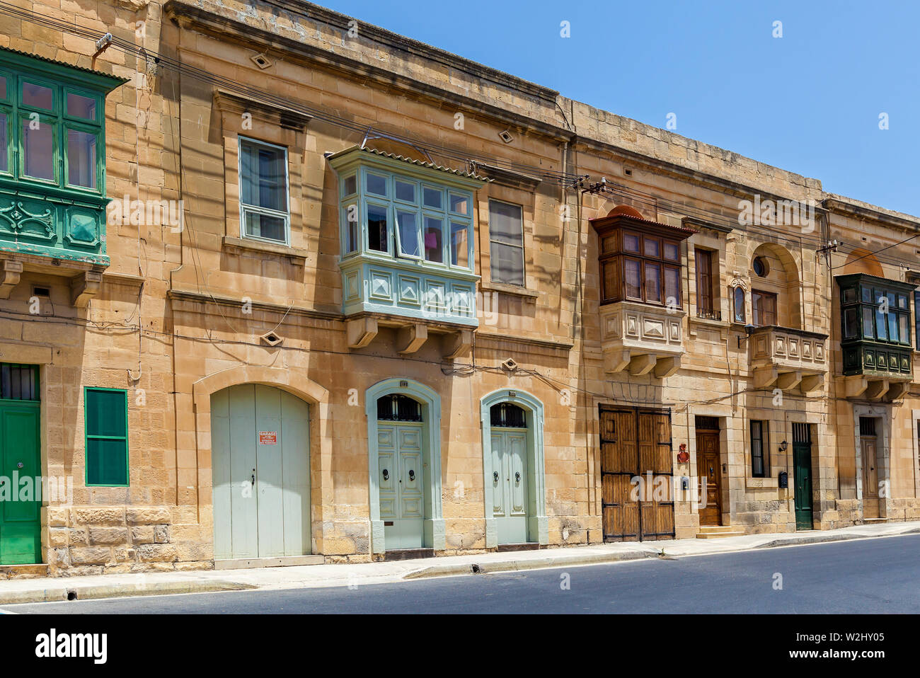 Architecture of Malta, the facade of the house with colorful wooden ...