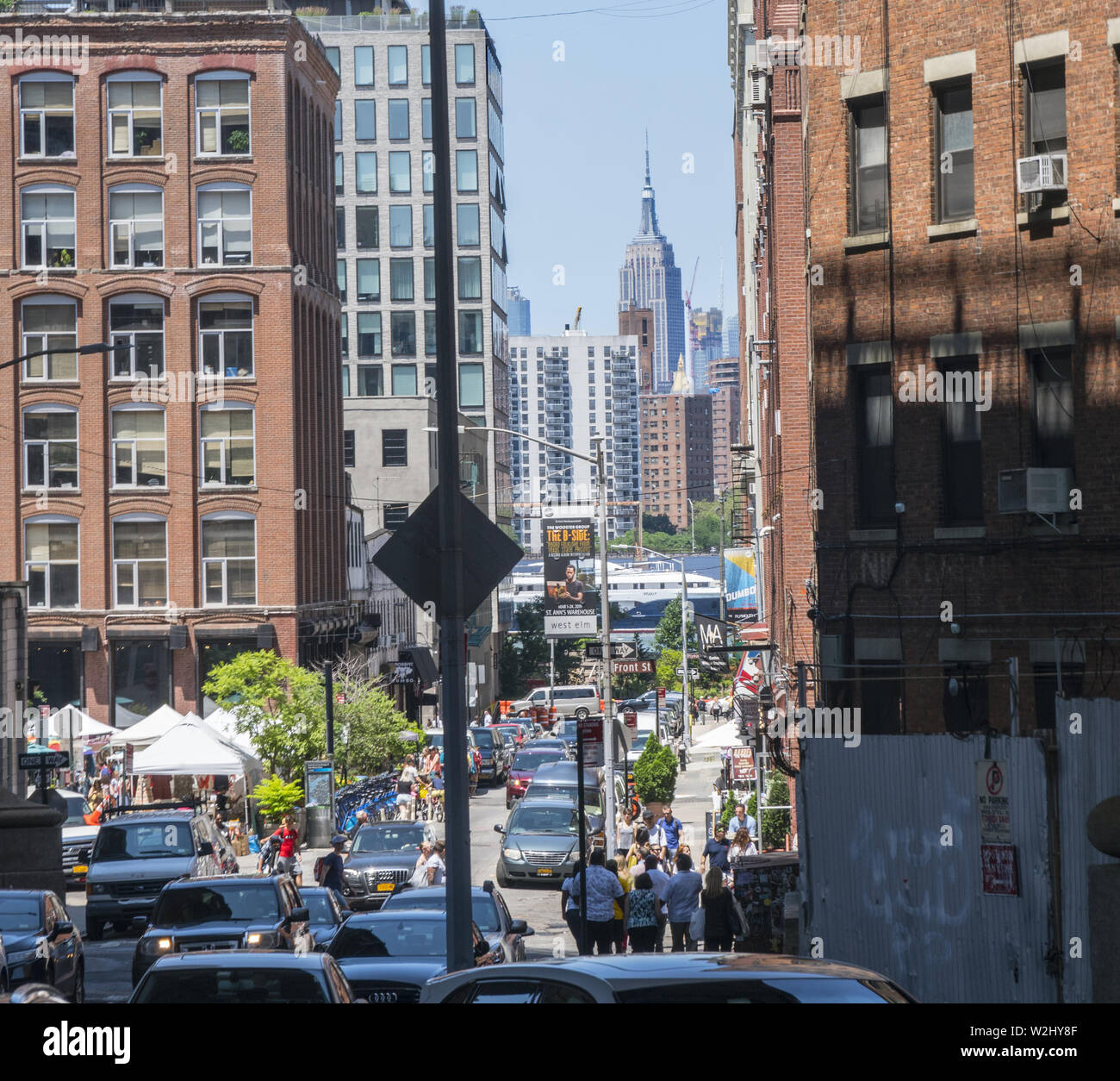 The popular DUMBO neighborhood in Brooklyn with a view of the Empire ...