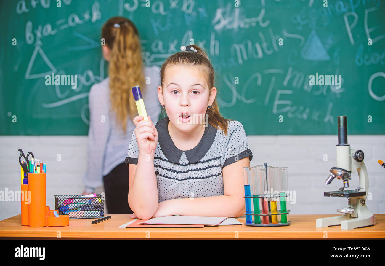 Microscope test tubes chemical reactions. Pupils at chalkboard ...