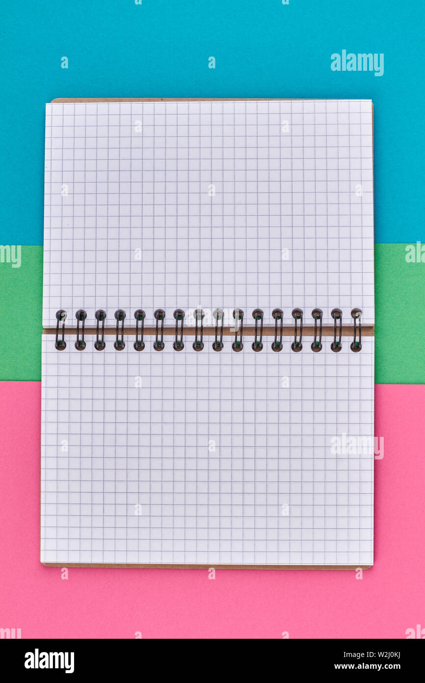 Blank binder notebook on color background Stock Photo - Alamy