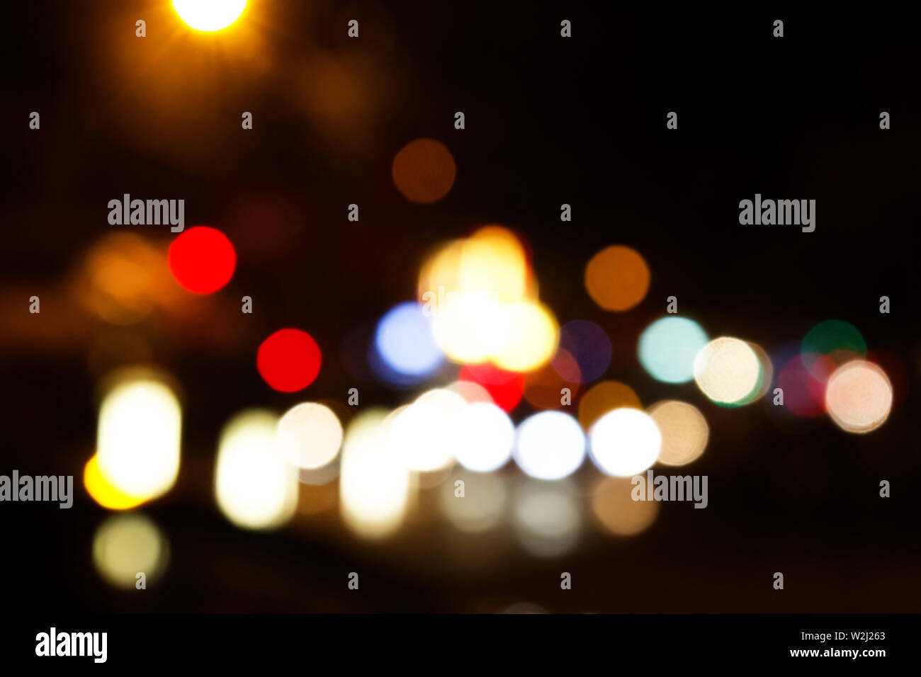 holiday bright bokeh blurred colorful background. Christmas colors in ...