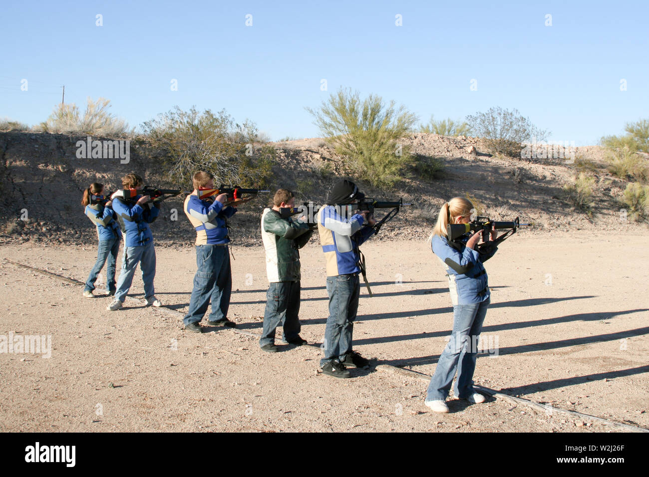 People Shooting Guns At A Range Winning The Gun Control Debate Starts