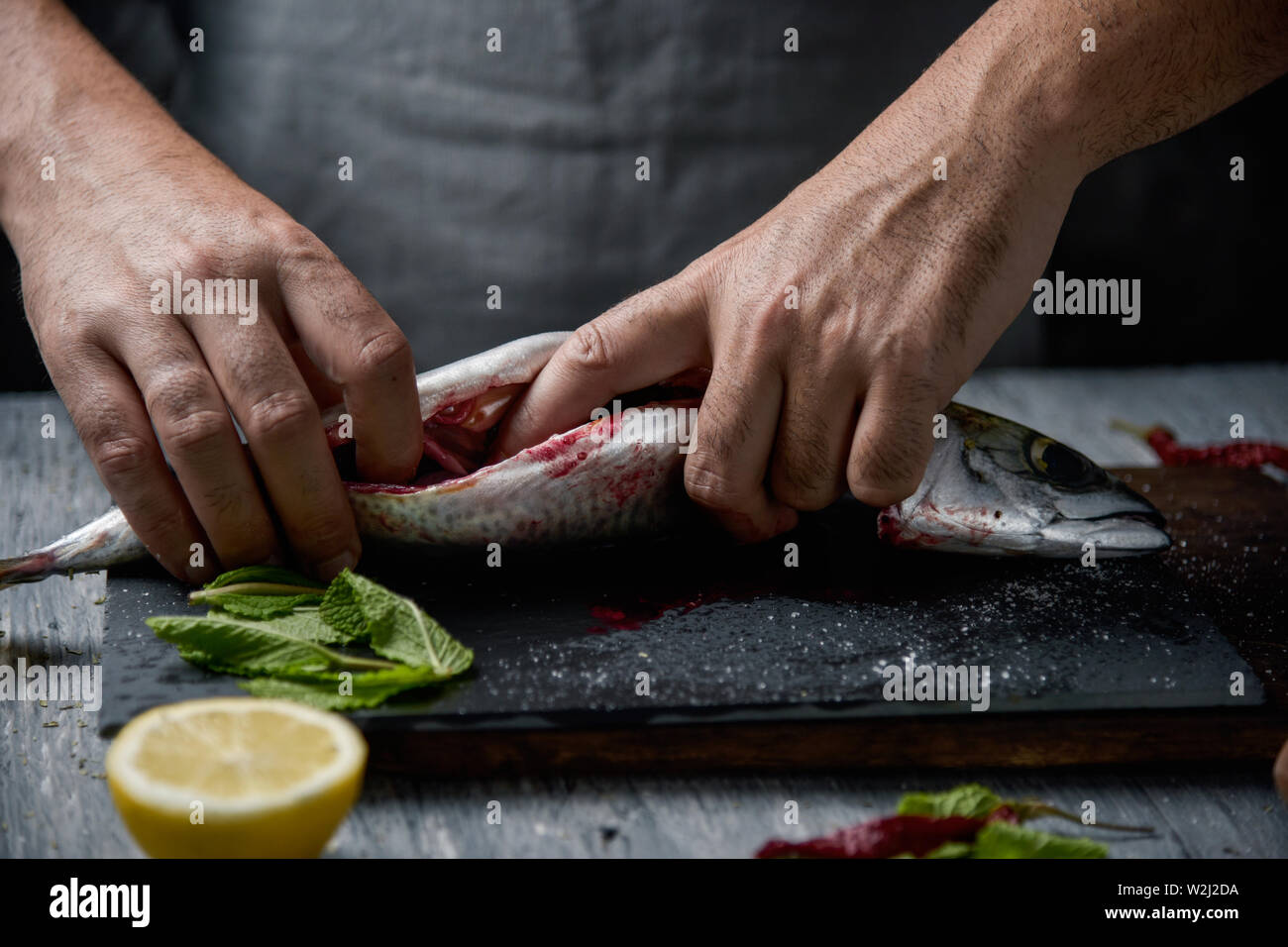 Young man cleaning table hi-res stock photography and images - Alamy