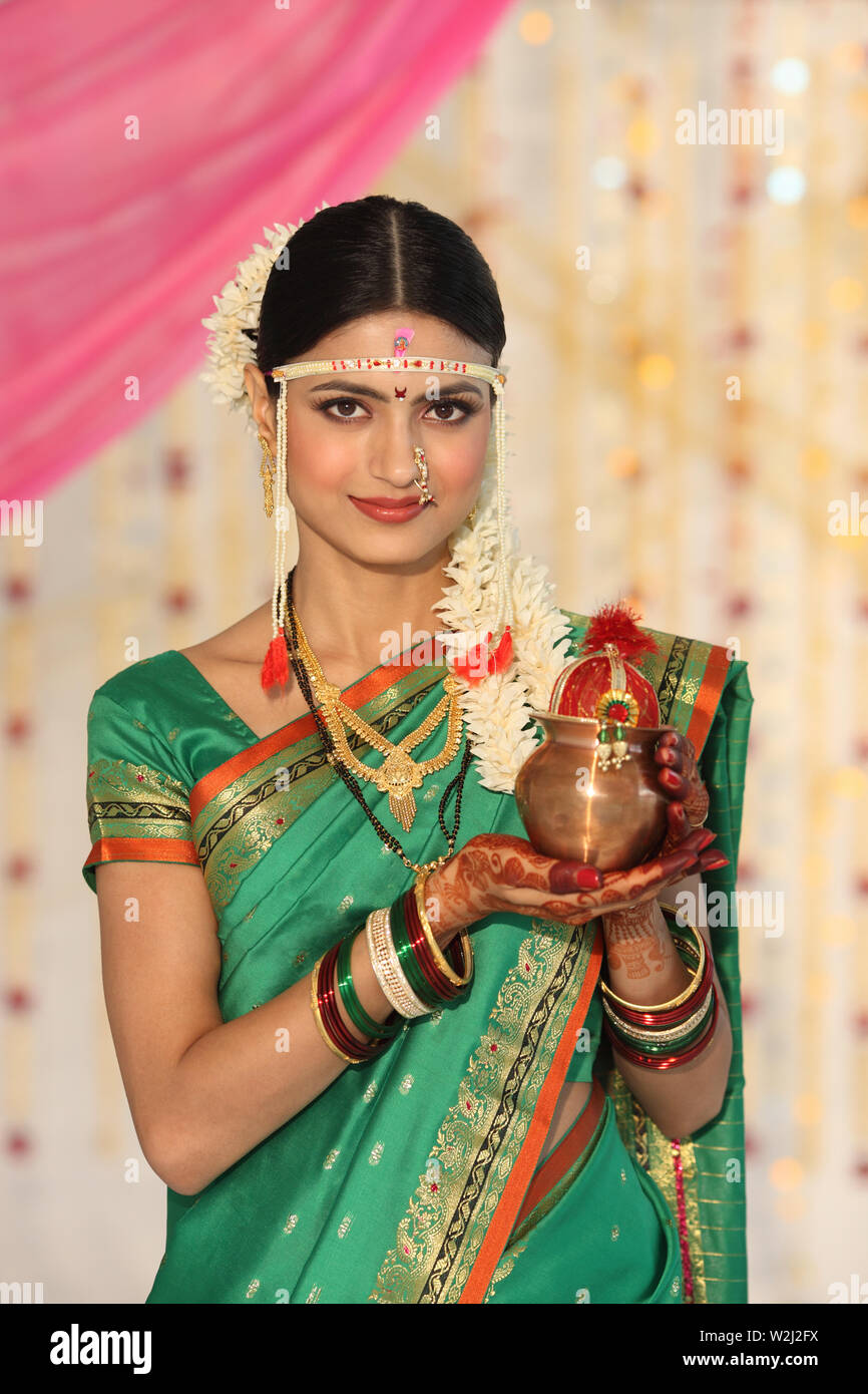 Woman performing puja on hi-res stock photography and images - Alamy