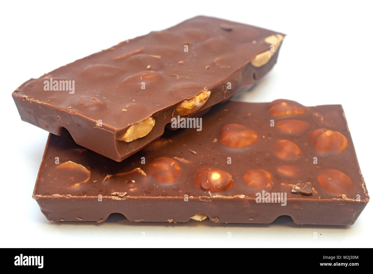 Chocolate with nuts isolated on white background Stock Photo - Alamy