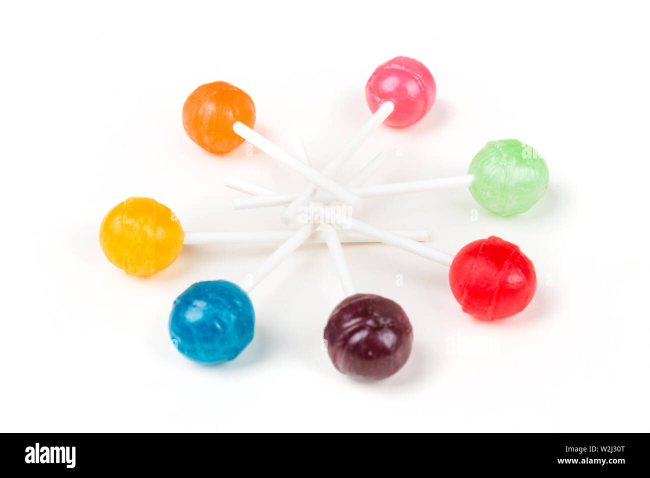Colorful arrangement of candy suckers on sticks Stock Photo - Alamy